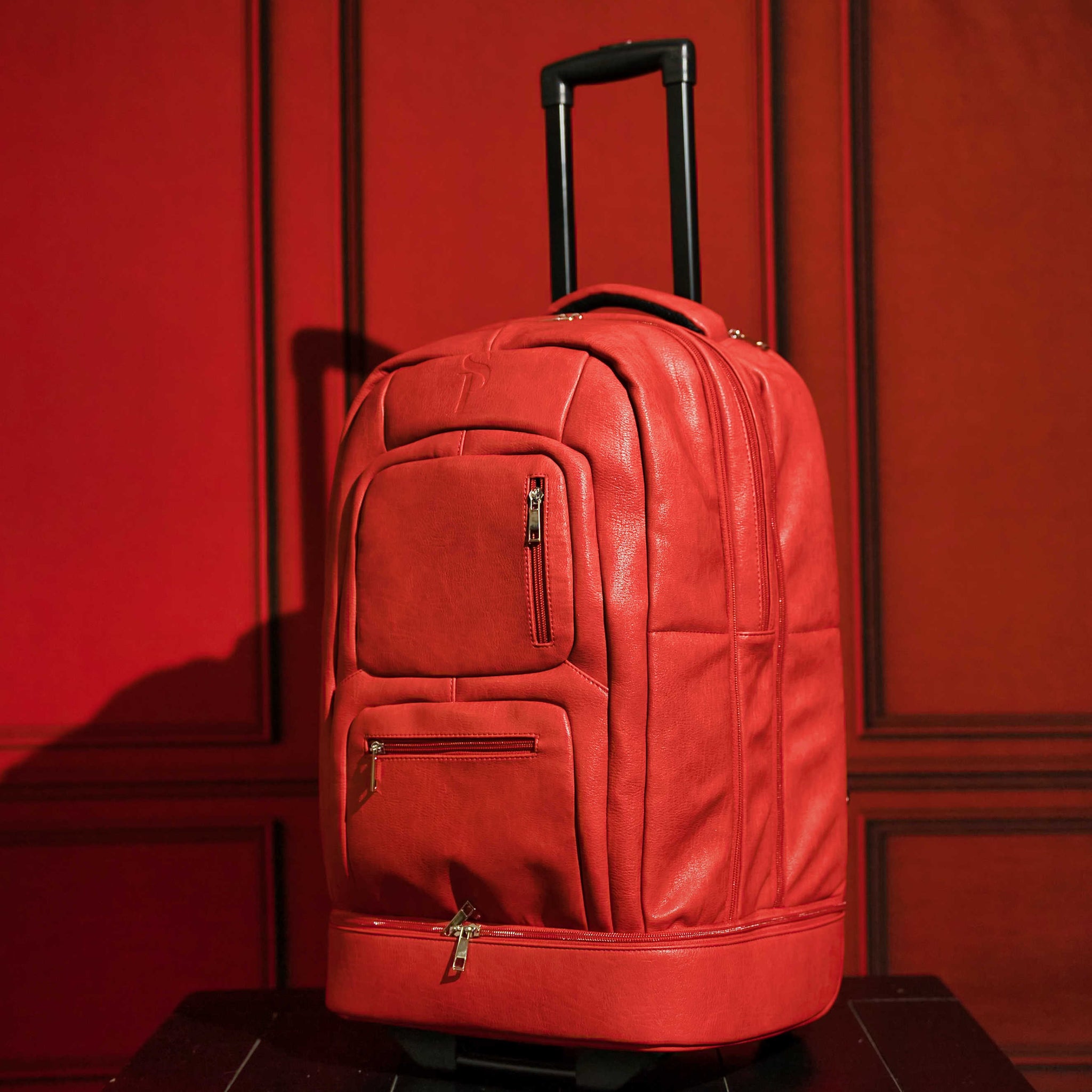 Red Leather Carry-On Roller Bag