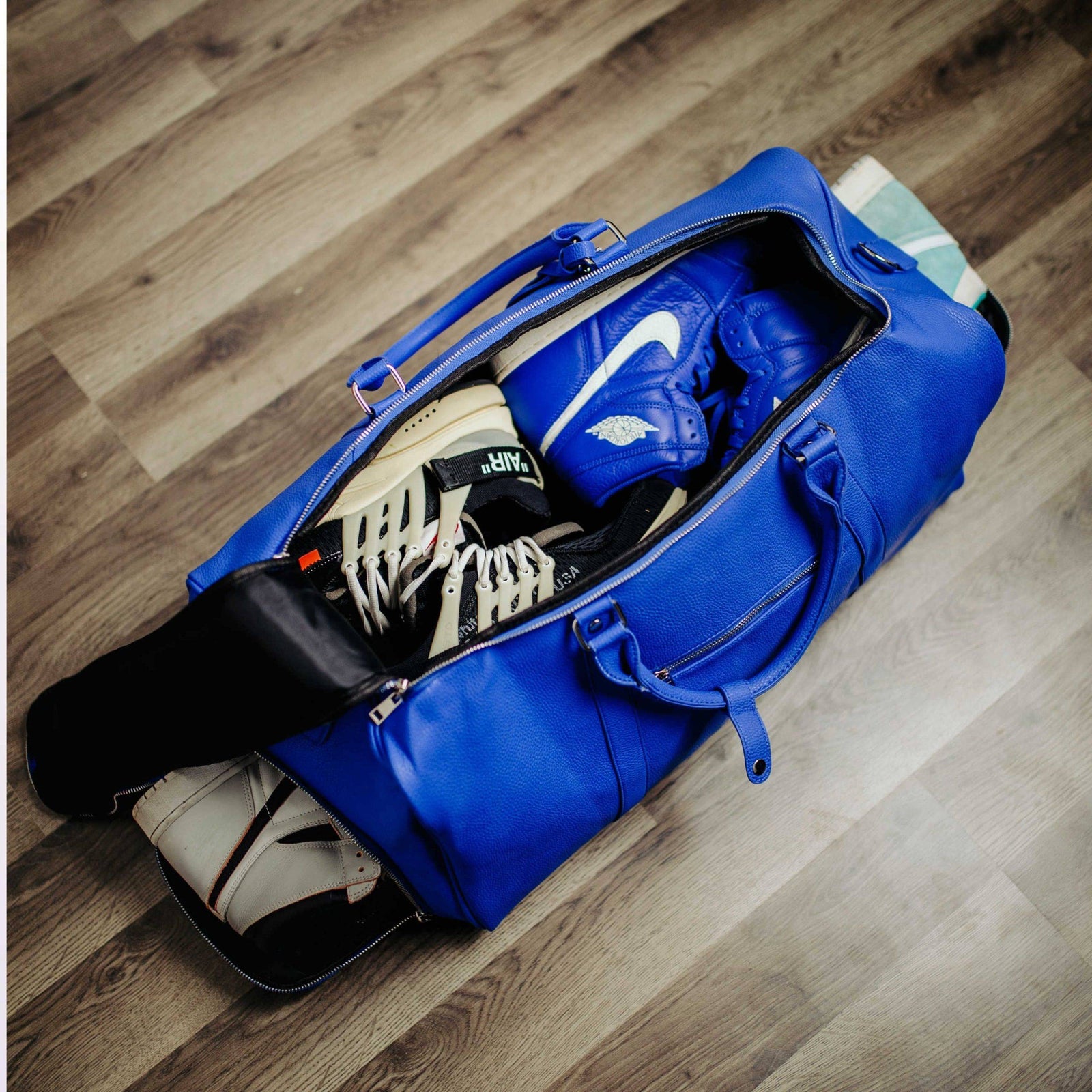 Royal Blue Leather Duffle Bag (Unbreakable Collab) 150 Made | Sole Premise